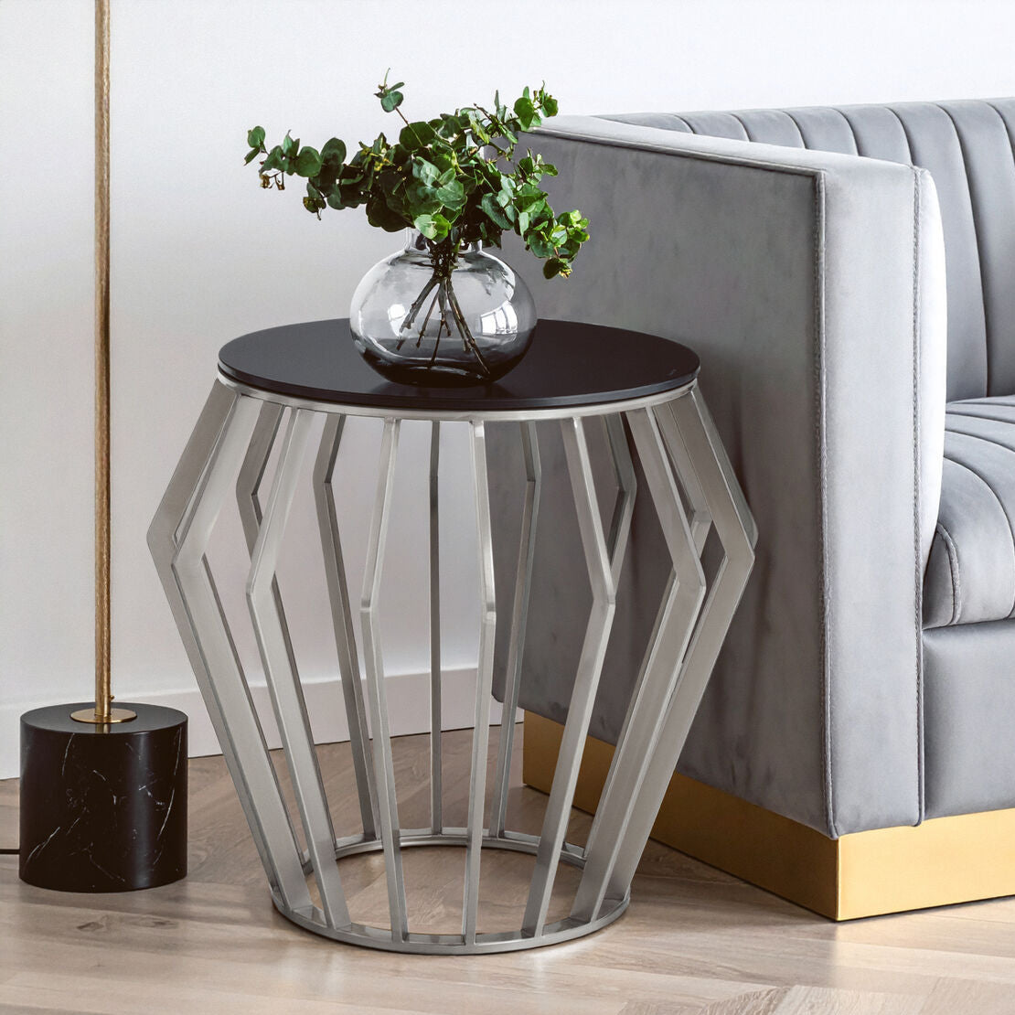 Shop Ackley Silver Round Table with Black Glass from Orsina