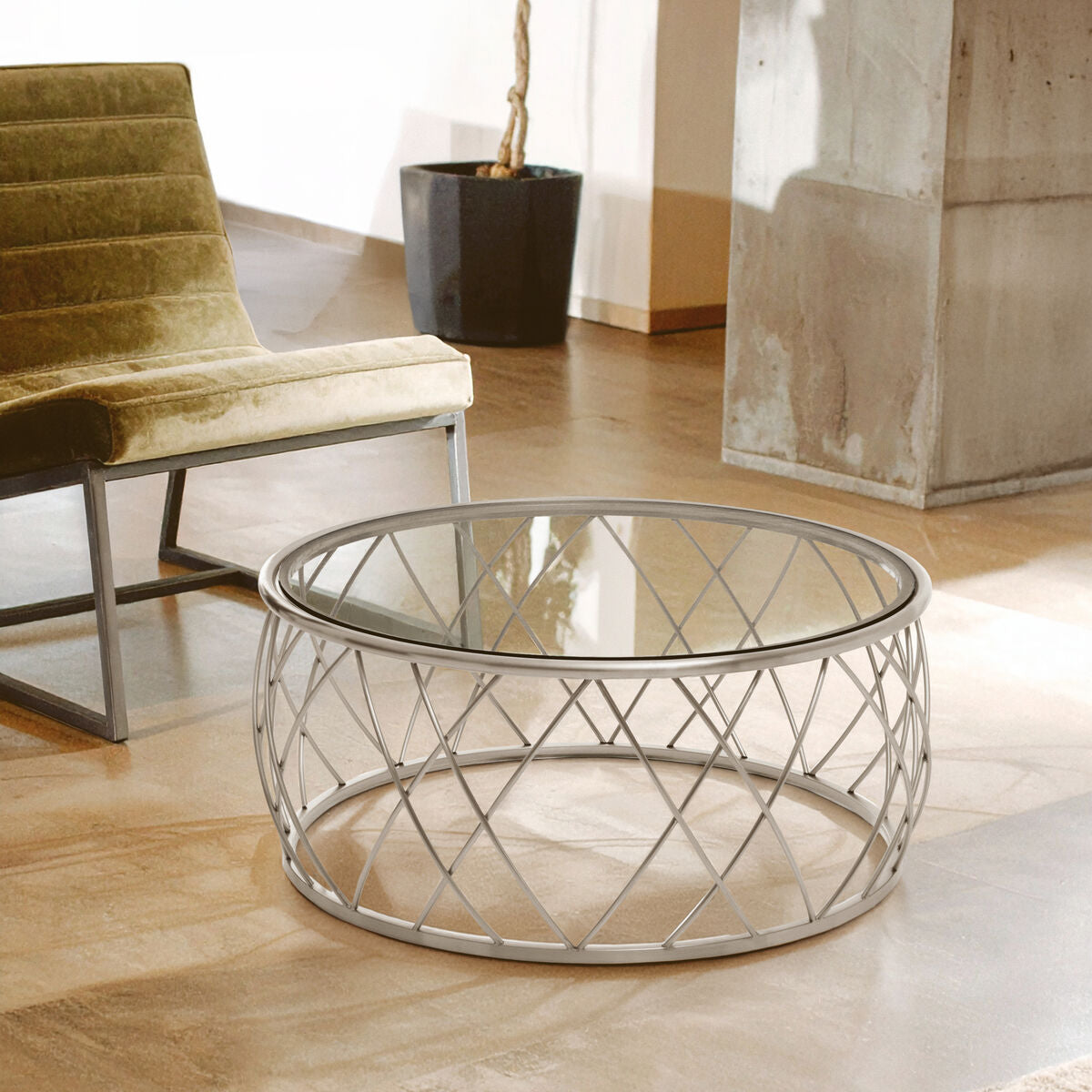 Shop Ackley Silver Round Coffee Table with Clear Glass from Orsina